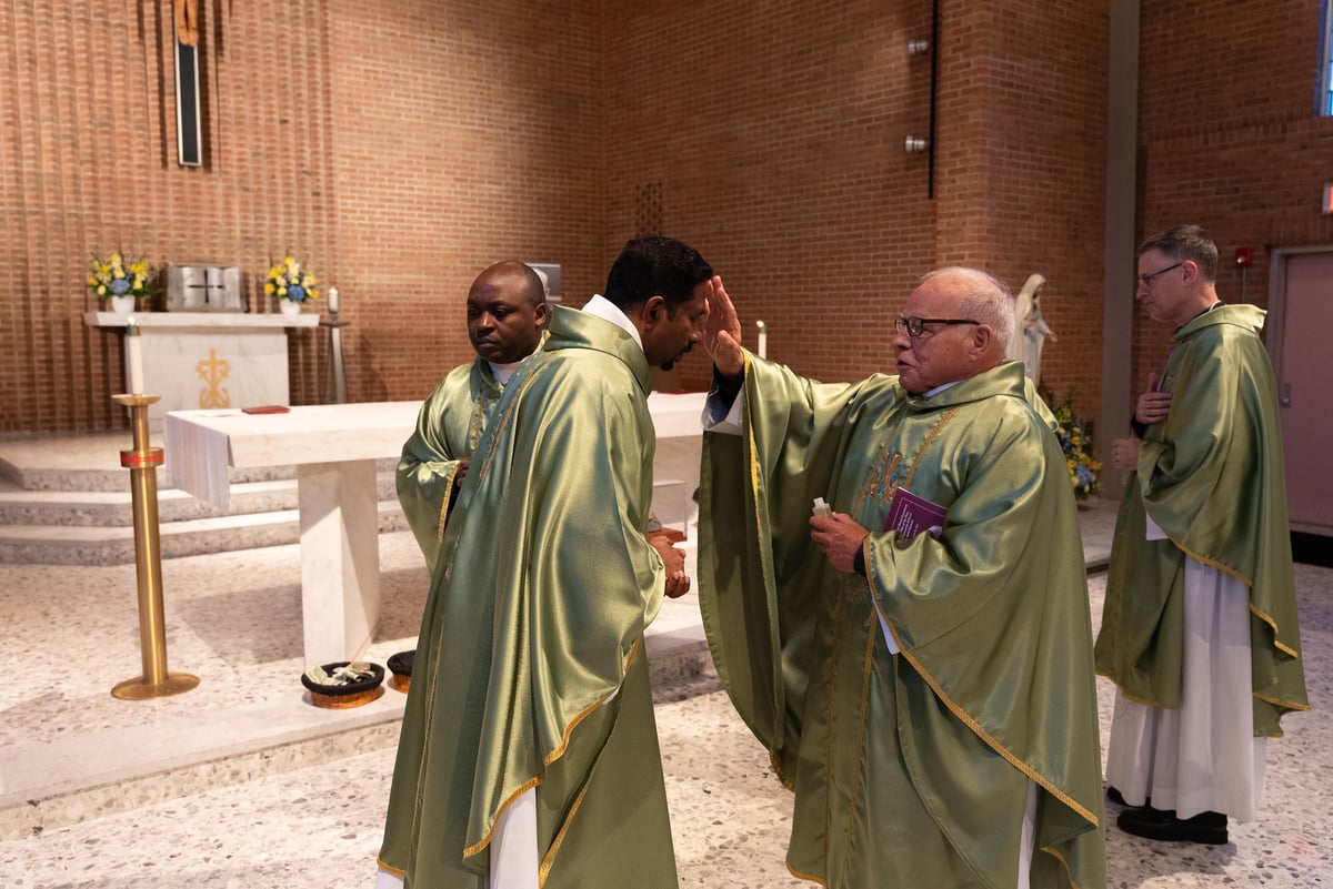 In Loving Memory of Father Wilfred Raymond, C.S.C.